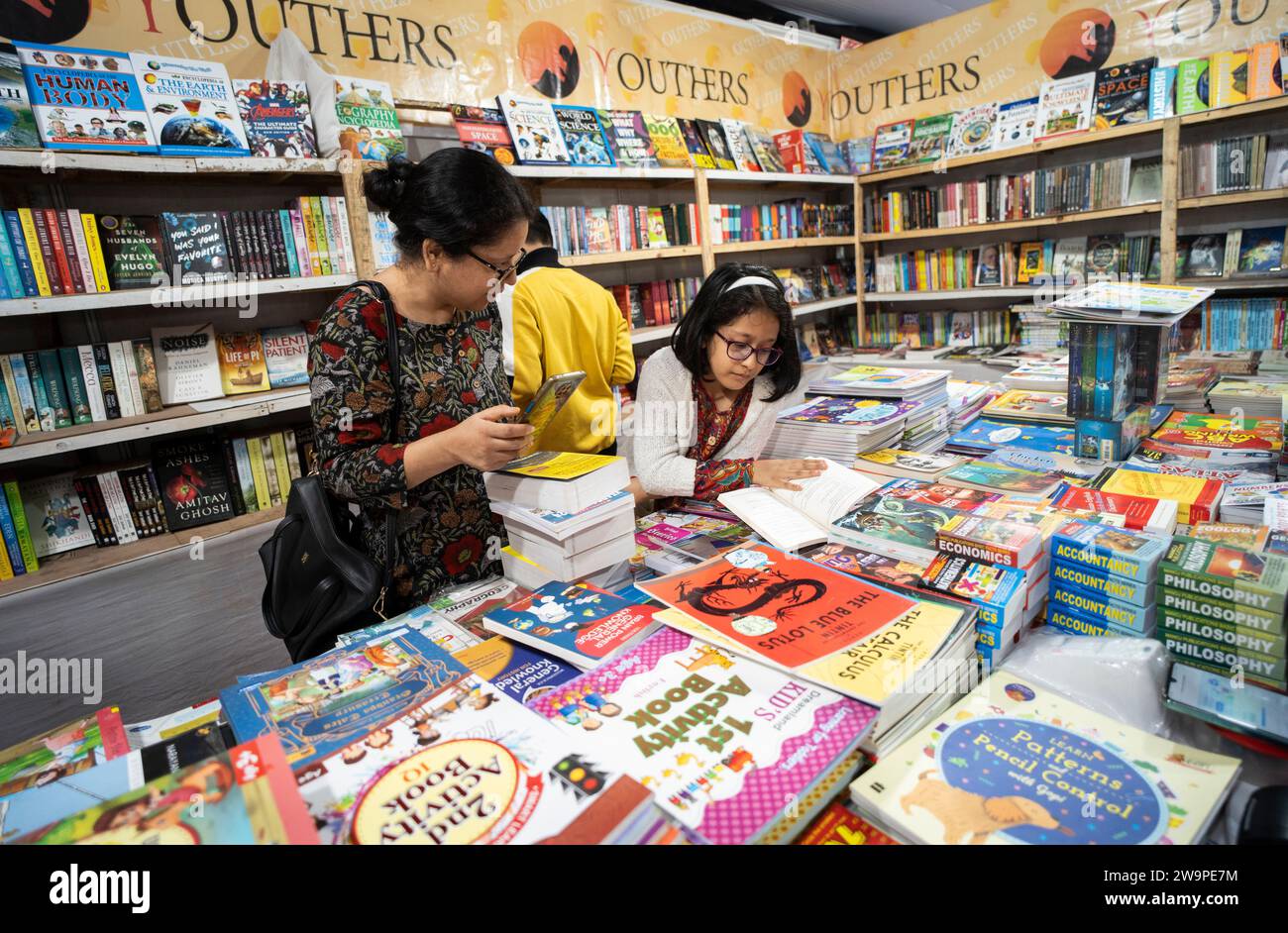 Book readers browsing books at a stall during Assam Book Fair, in Guwahati, Assam, India on 29 ...