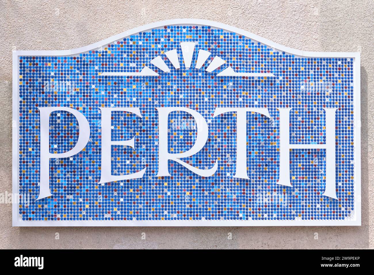 A colourful sign made of sequins is displayed on the wall of a downtown ...