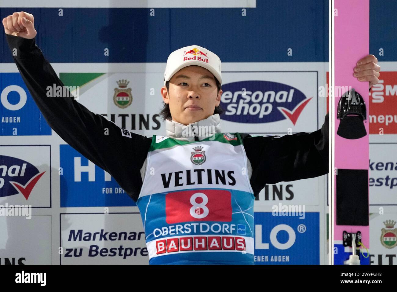 Ryoyu Kobayashi, of Japan, celebrates on the podium after finishing ...