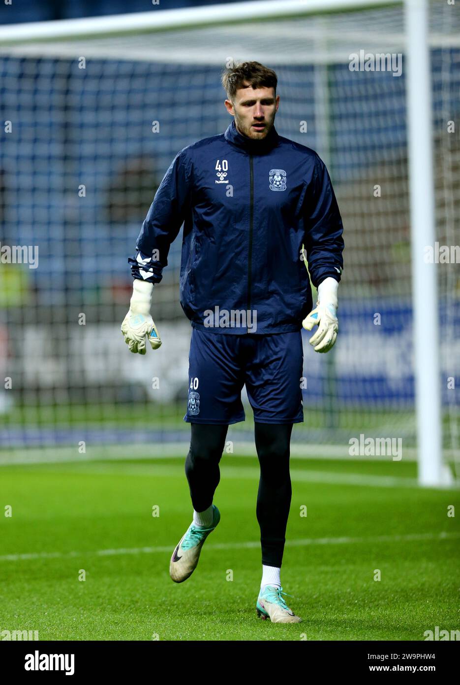 Coventry City goalkeeper Bradley Collins warms up ahead of the Sky Bet ...