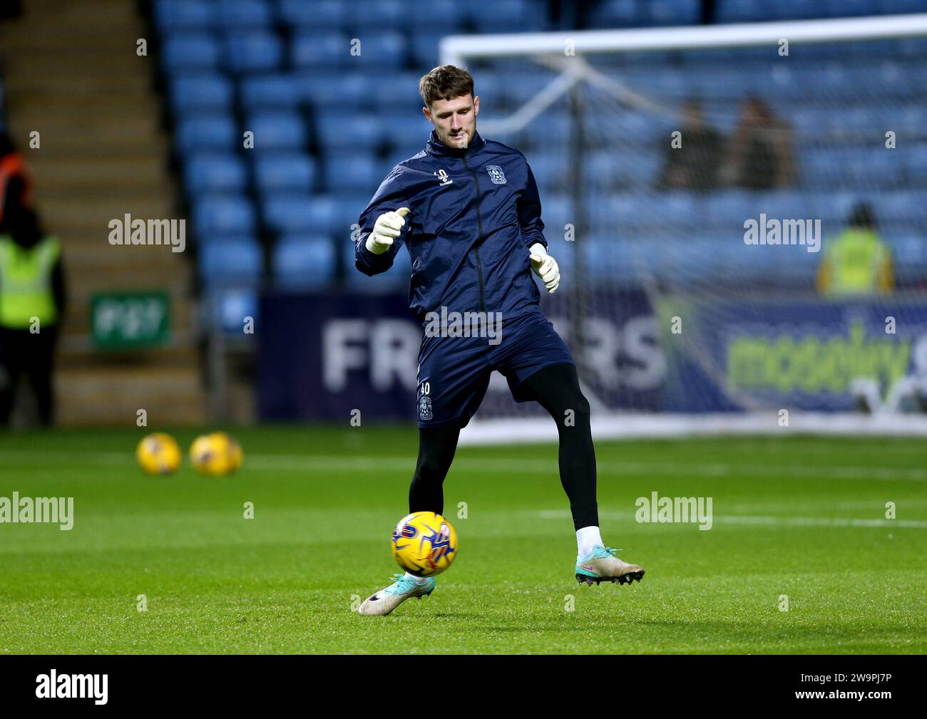 Coventry City goalkeeper Bradley Collins warms up ahead of the Sky Bet ...