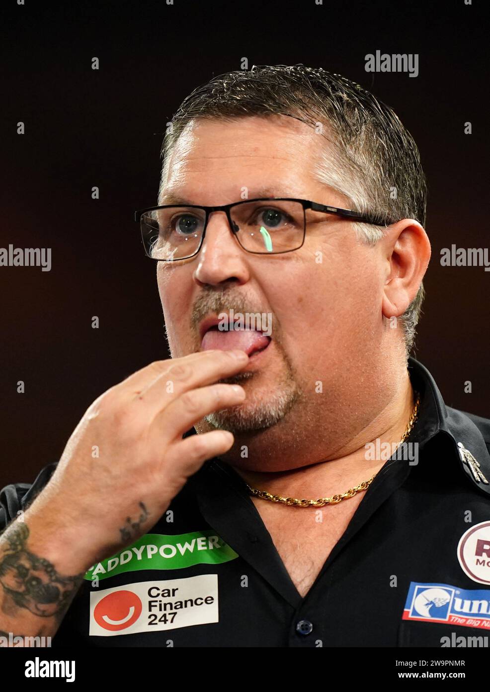 Gary Anderson in action against Boris Krcmar (not pictured) on day ...