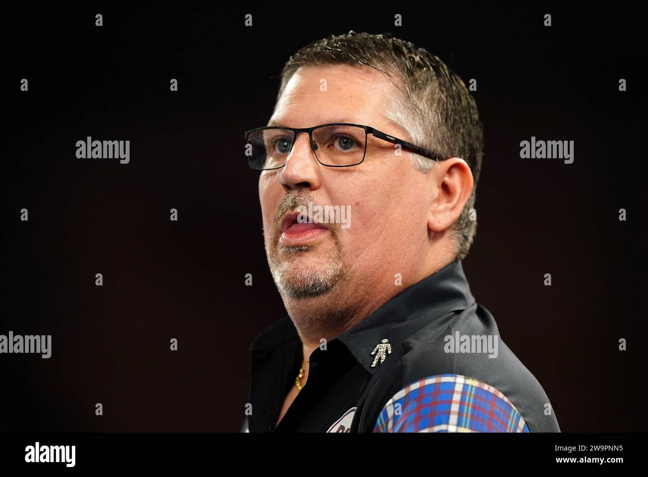 Gary Anderson in action against Boris Krcmar (not pictured) on day ...