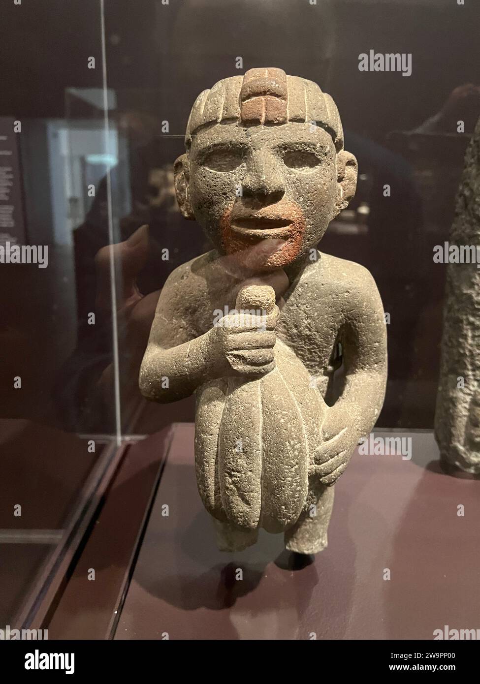 Aztec Man Carrying a Cacao Pod, 1440-1521. Volcanic stone, traces of ...