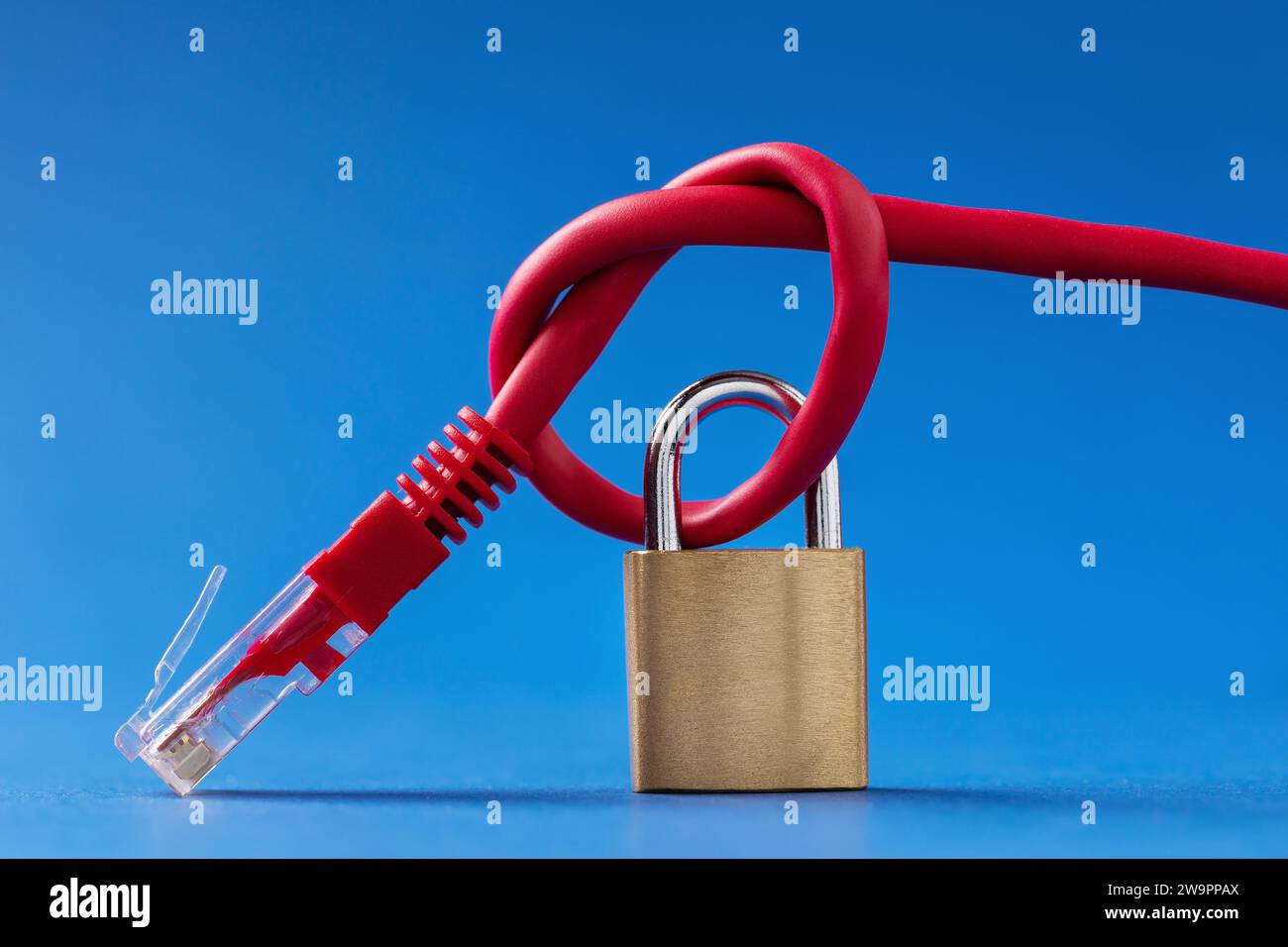 Lock and knotted computer network wire on a blue background Stock Photo ...