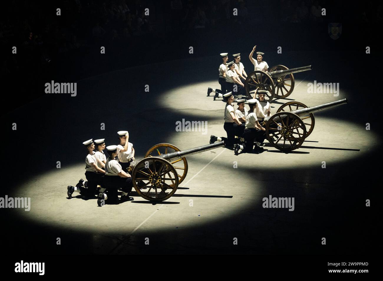 Royal Canadian Navy cadets in the spotlight about to fire artillery ...