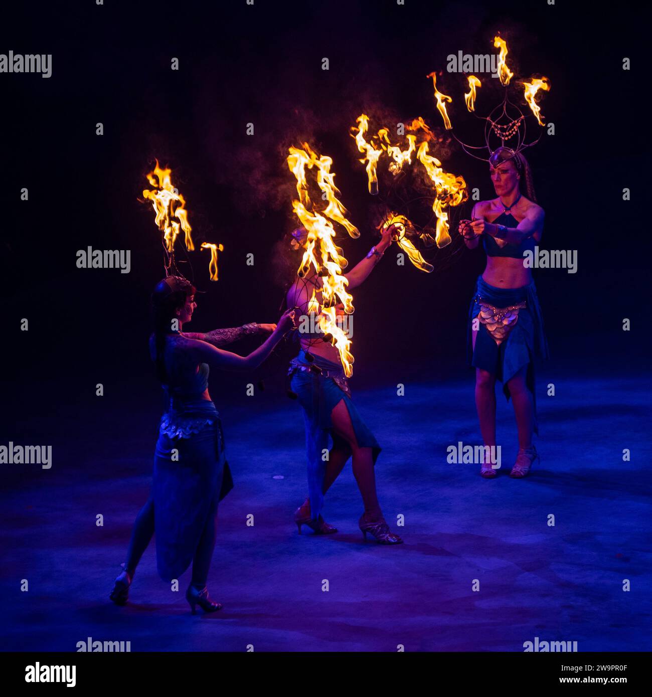 Fire dancers from Serpentine Studio perform a fire dance at the 2023 ...