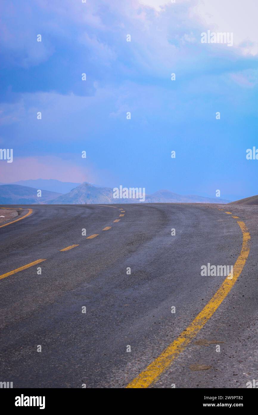 sharp bend asphalt road in the mountain Stock Photo - Alamy