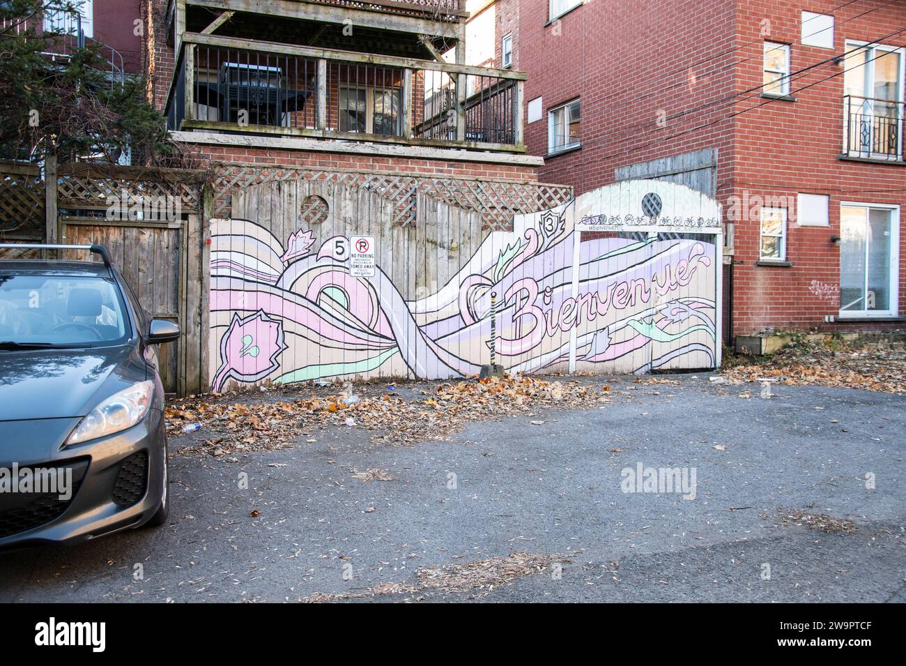 Welcome mural on a wooden fence in downtown Montreal, Quebec, Canada ...