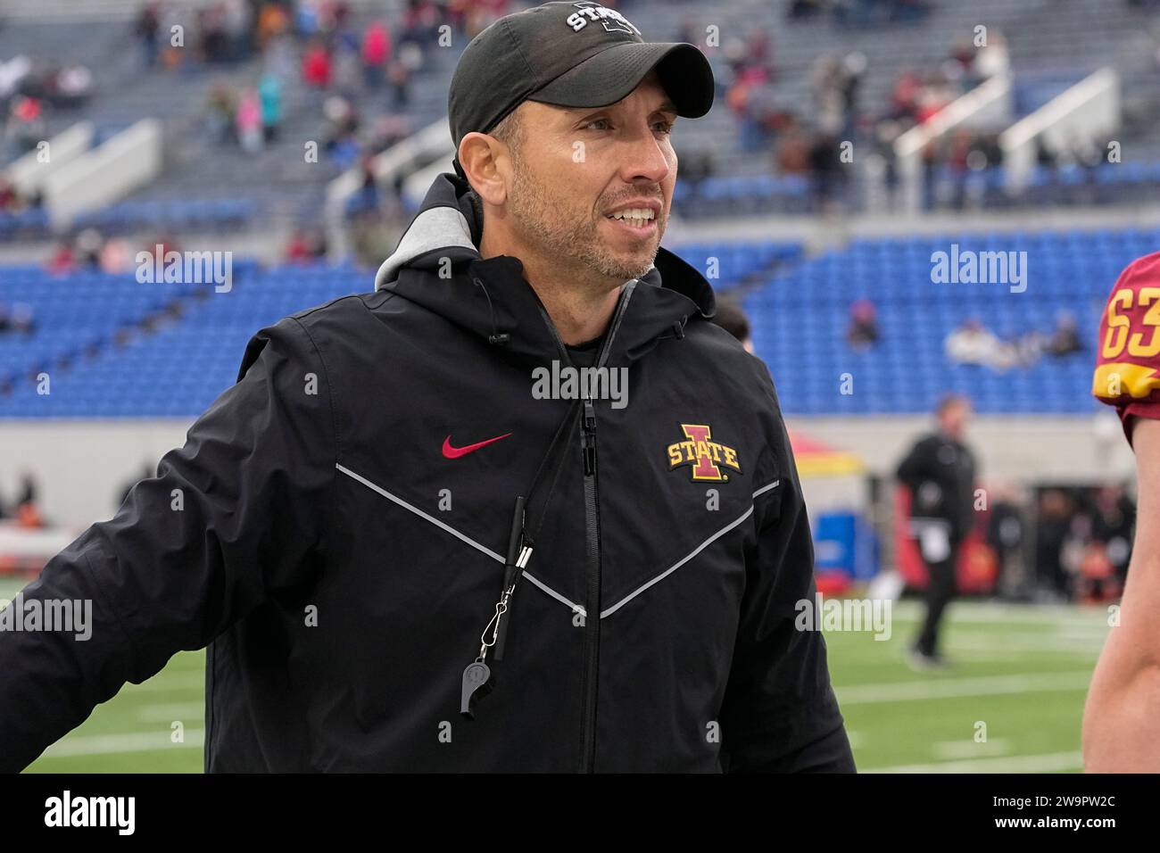 Iowa State head coach Matt Campbell watches his team warm up before the ...