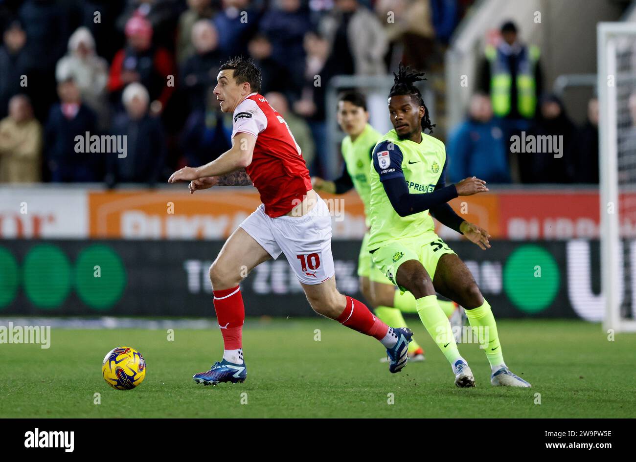 Rotherham United's Jordan Hugill (left) gets past Sunderland's Pierre ...