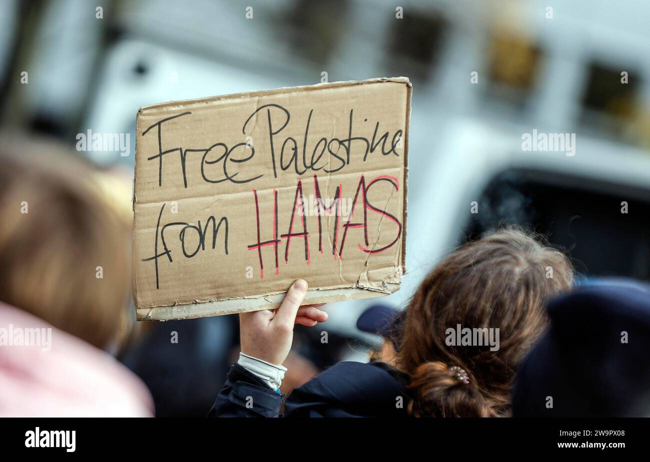 A participant in the demonstration Solidarity March with Israel shows a ...