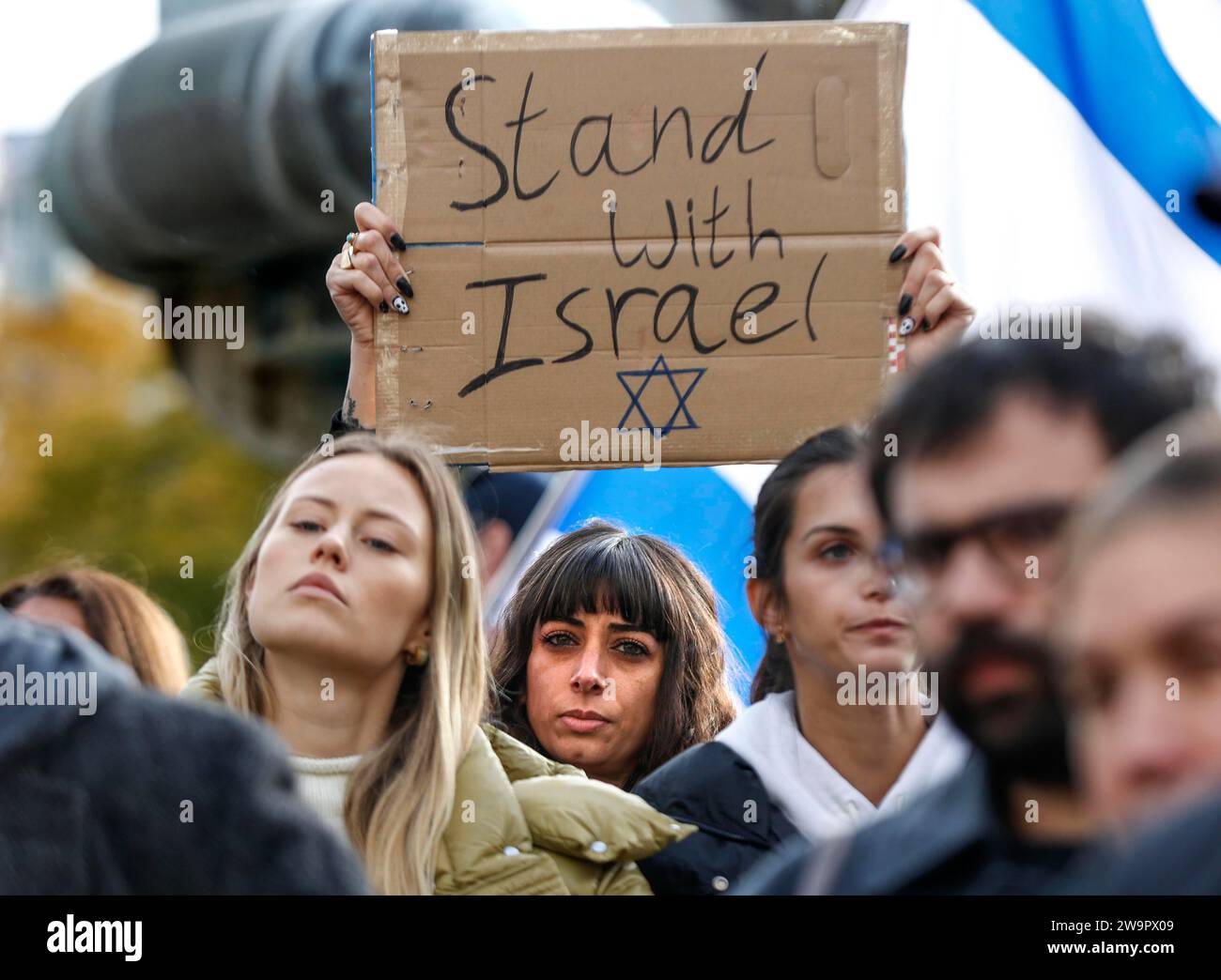 A participant in the demonstration Solidarity March with Israel shows a ...