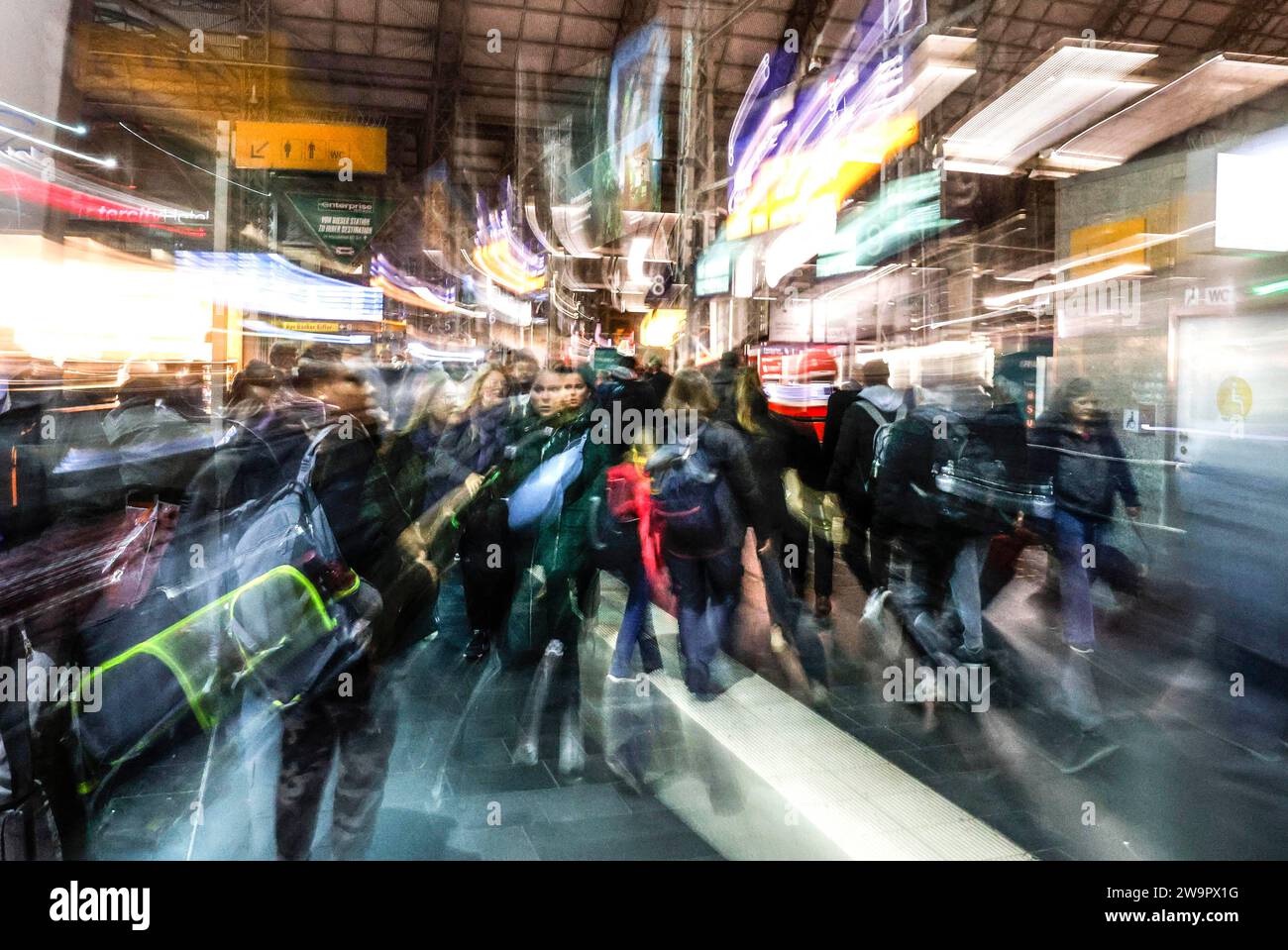 Dense crowds at Frankfurt Central Station. Around half a million people pass through the station ...