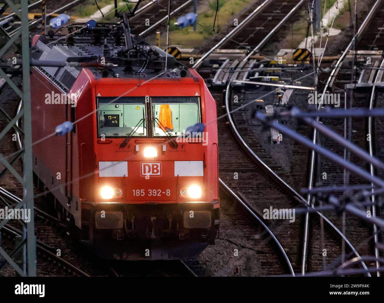DB Cargo class 185 locomotive in the DB Cargo marshalling yard in Halle ...