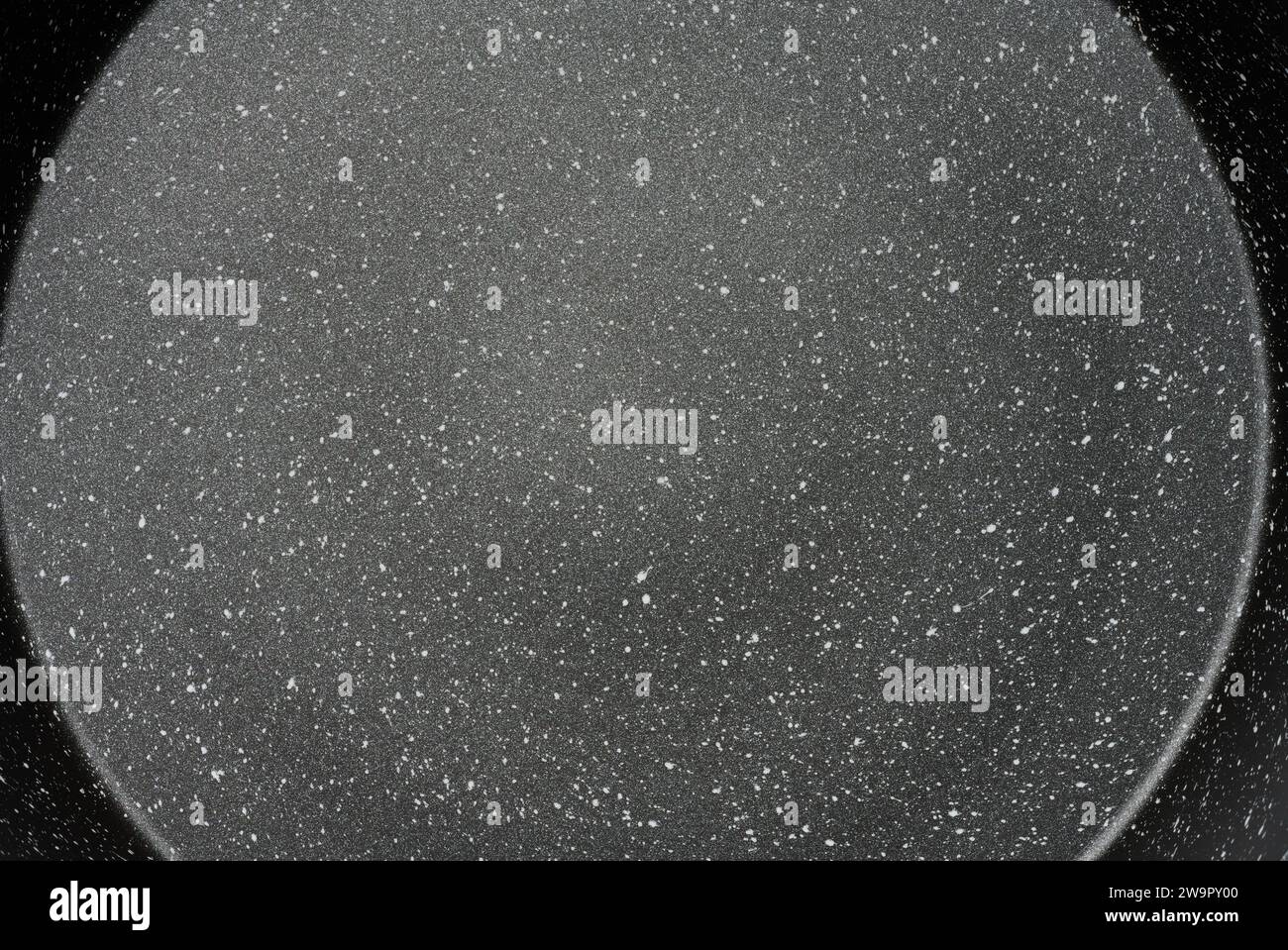 Texture of black non-stick surface of a frying pan Stock Photo - Alamy