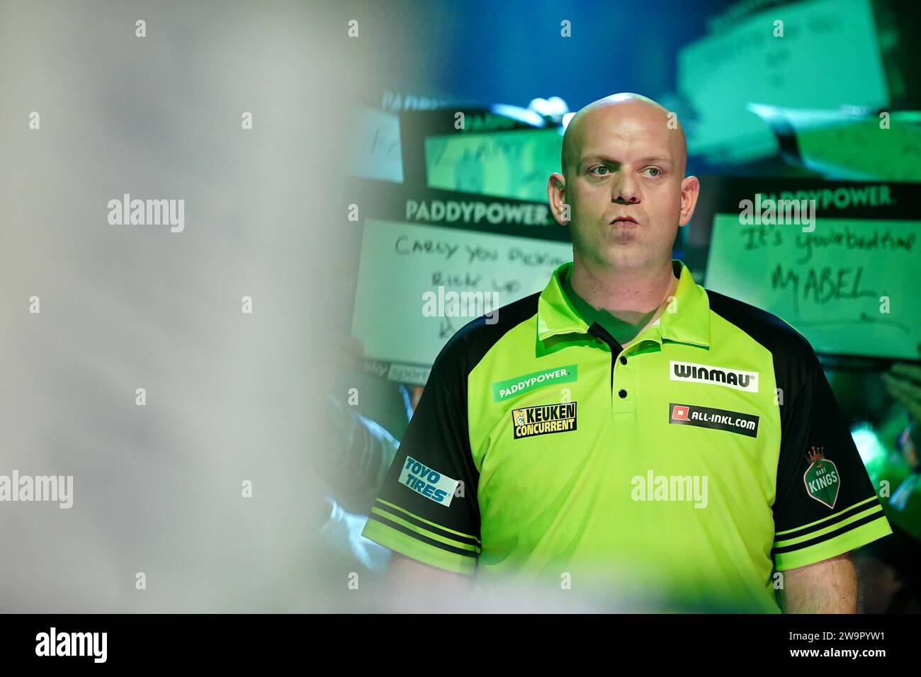 Michael van Gerwen walks out to play Stephen Bunting (not pictured) on ...