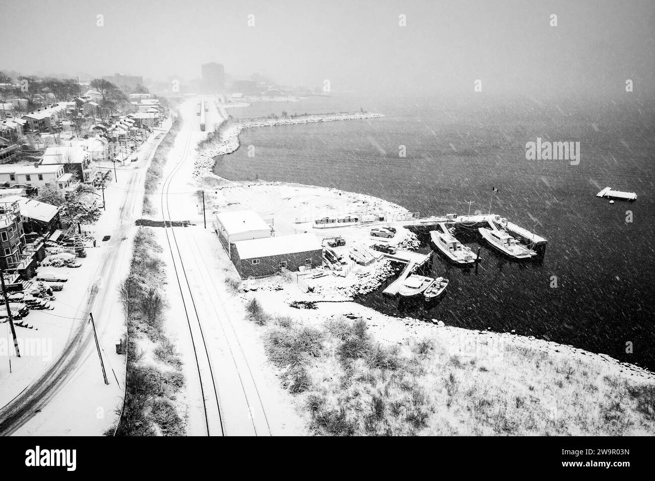 Aerial view of downtown Dartmouth near Shore Road during a snowstorm in ...