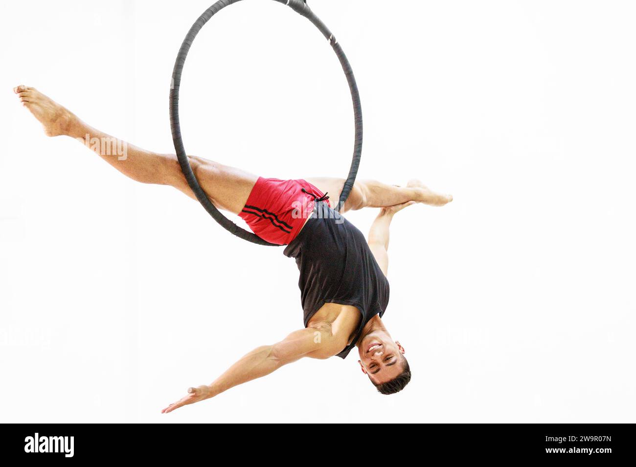 Executing dynamic and spiraling movements, he crafts an intense routine ...