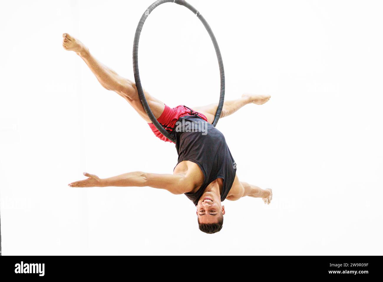 Performing a high-level routine, he balances strength and agility with ...