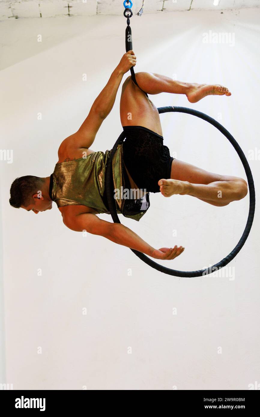 Solo in a Cirque-style setting, the male gymnast from Mexico engages in ...