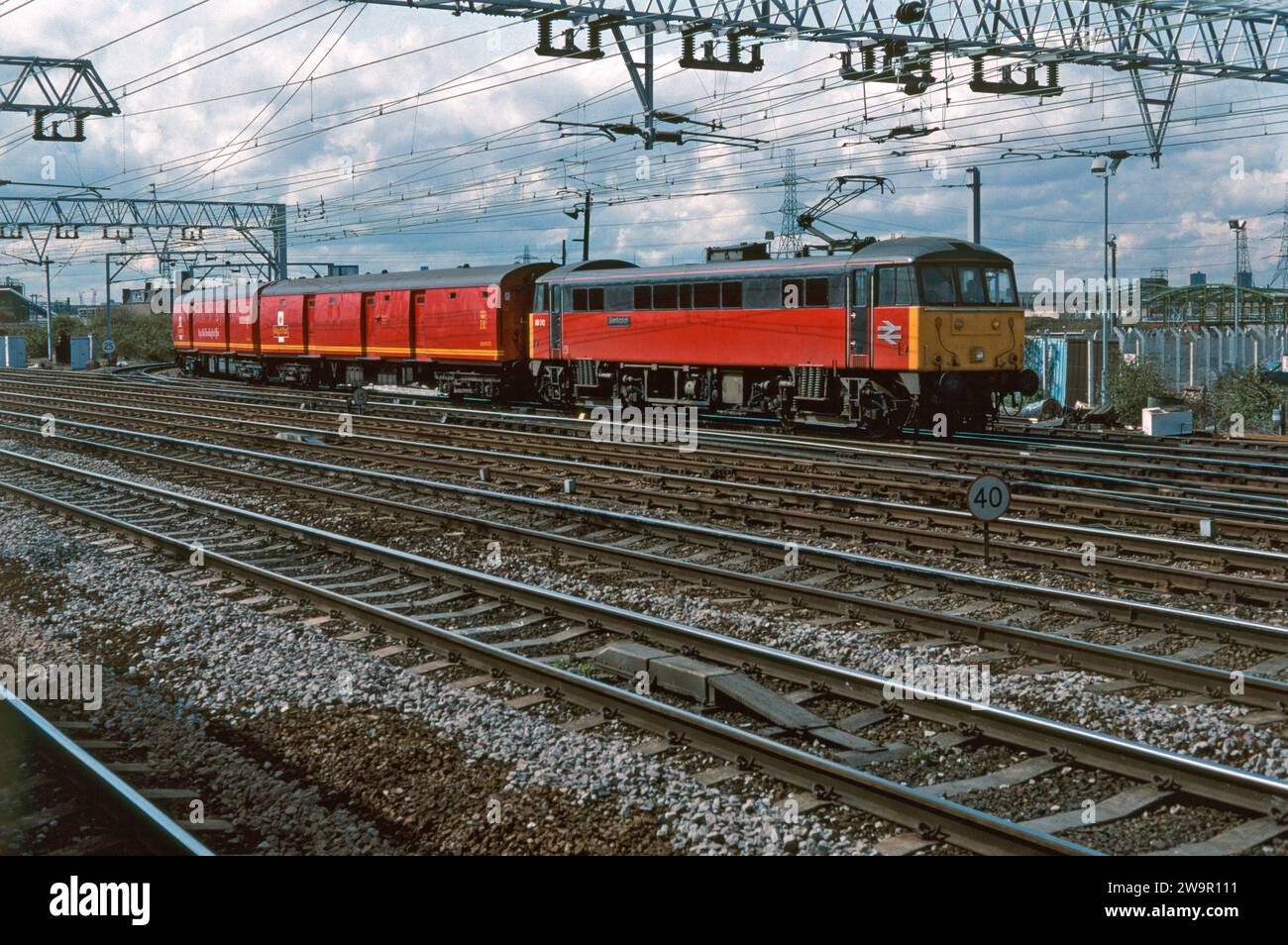 A Class 86 electric locomotive number 86241 with a train of travelling ...