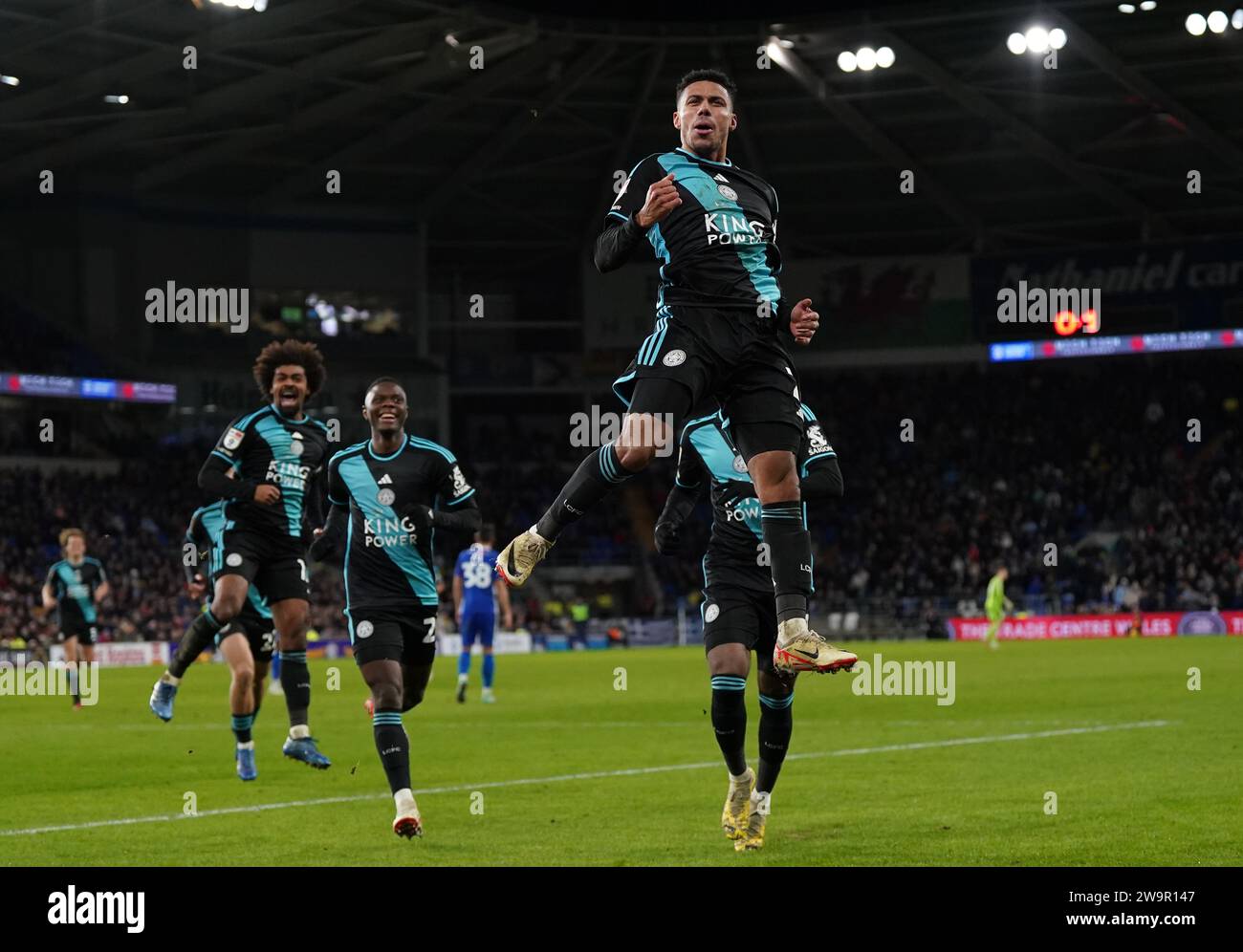 Leicester City's James Justin (right) celebrates with team-mates after ...