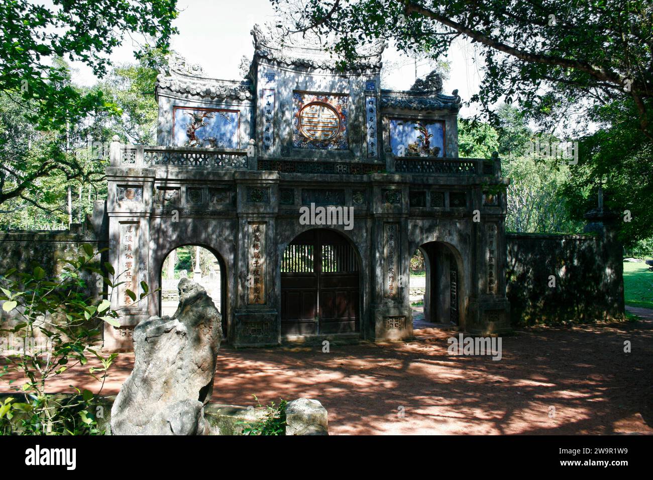 The triple gate at Tu Hieu Pagoda in Hue, Central Vietnam Stock Photo ...