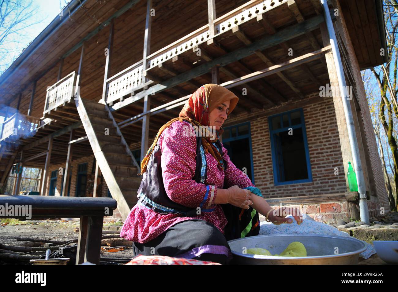 Rasht, Gilan, Iran. 29th Dec, 2023. An Iranian Gilani woman bakes ...