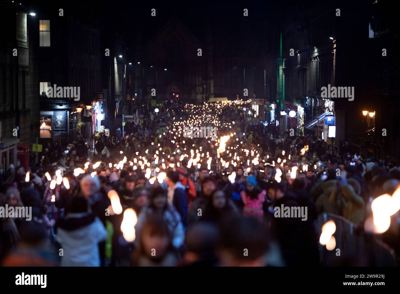 Edinburgh, UK. 29th Dec, 2023. Torchlight Procession back for 30th ...