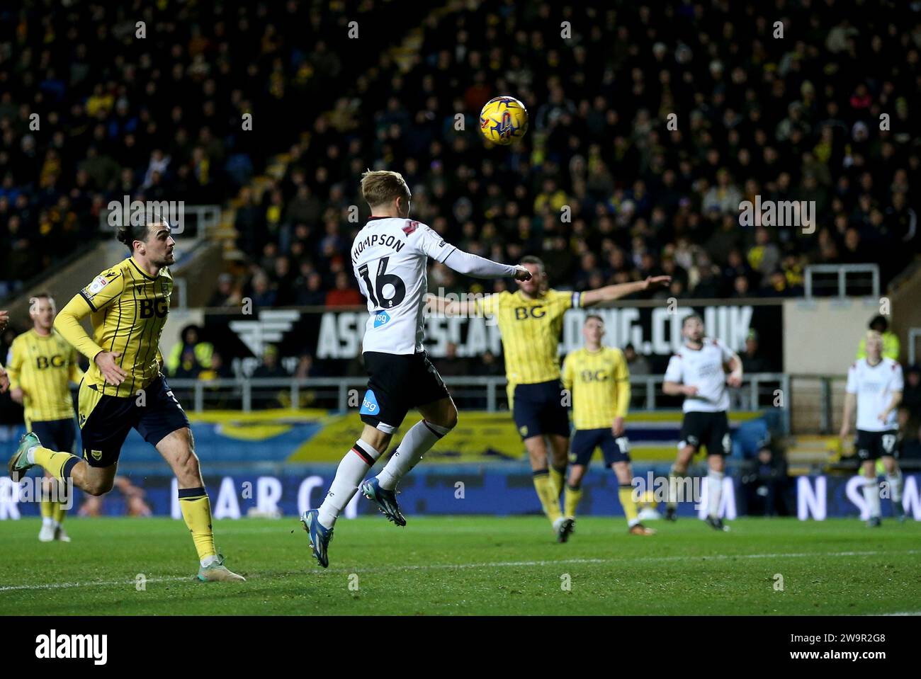 Derby County's Liam Thompson (centre) scores his sides second goal of ...