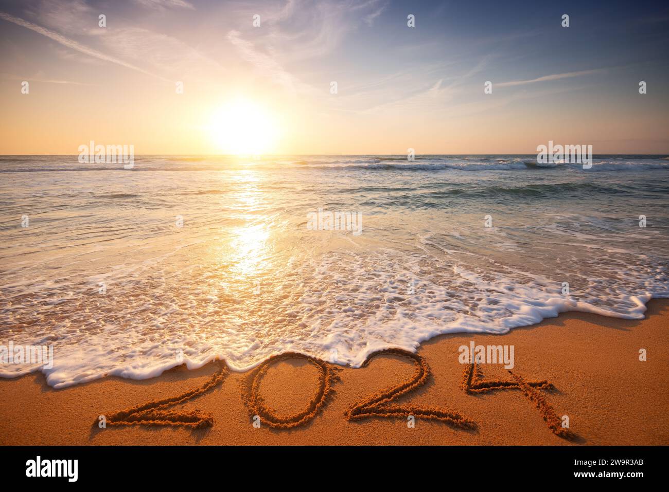 Happy New Year 2024 concept, lettering on the beach. Written text on ...