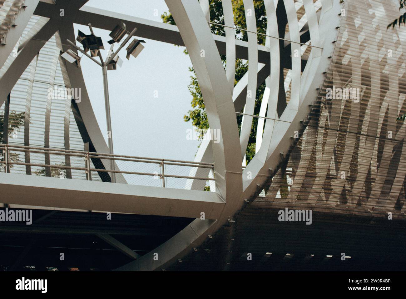 Modern overhead pedestrian tunnel metal air bridge exterior in city ...