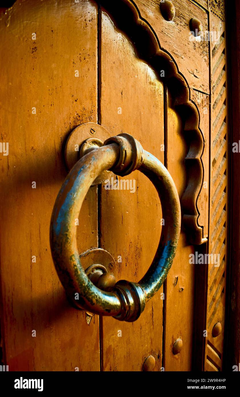 Vintage round door handle with intricate detailing, adding a touch of ...