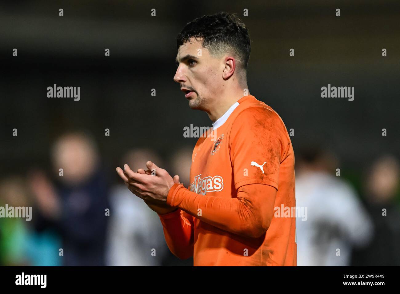 Albie Morgan of Blackpool applauds the fans at the end of the Sky Bet ...