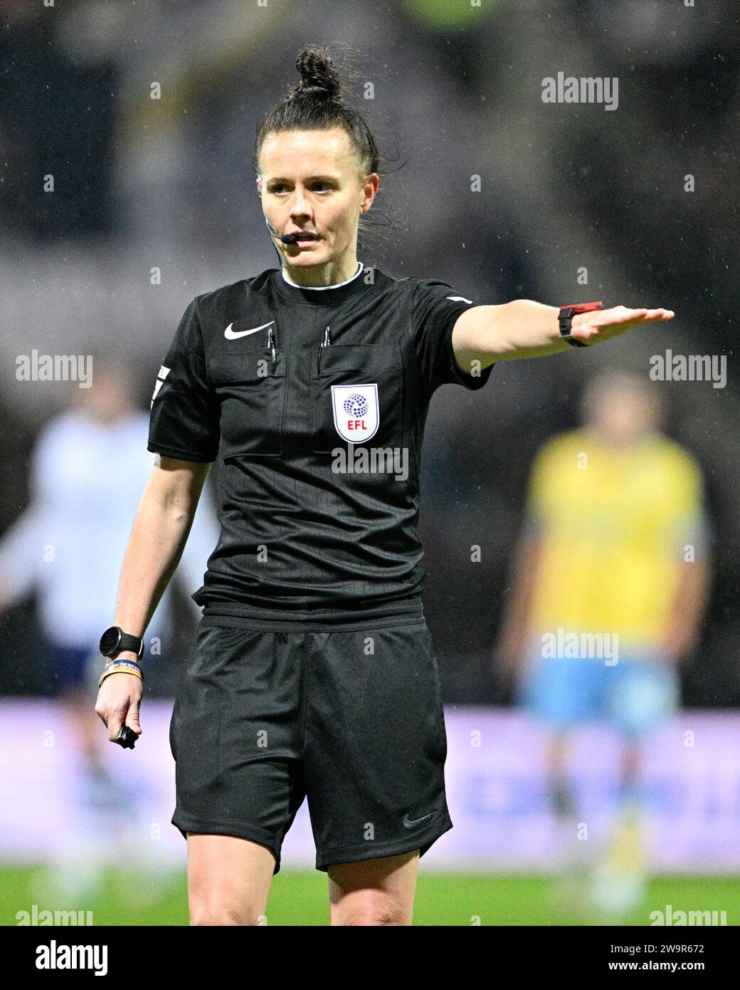 Preston, UK. 29th Dec, 2023. Referee Rebecca Welch points for a goal ...