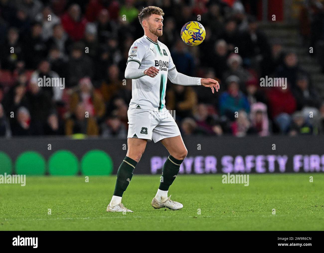 Dan Scarr #6 of Plymouth Argyle controls the ball during the Sky Bet ...