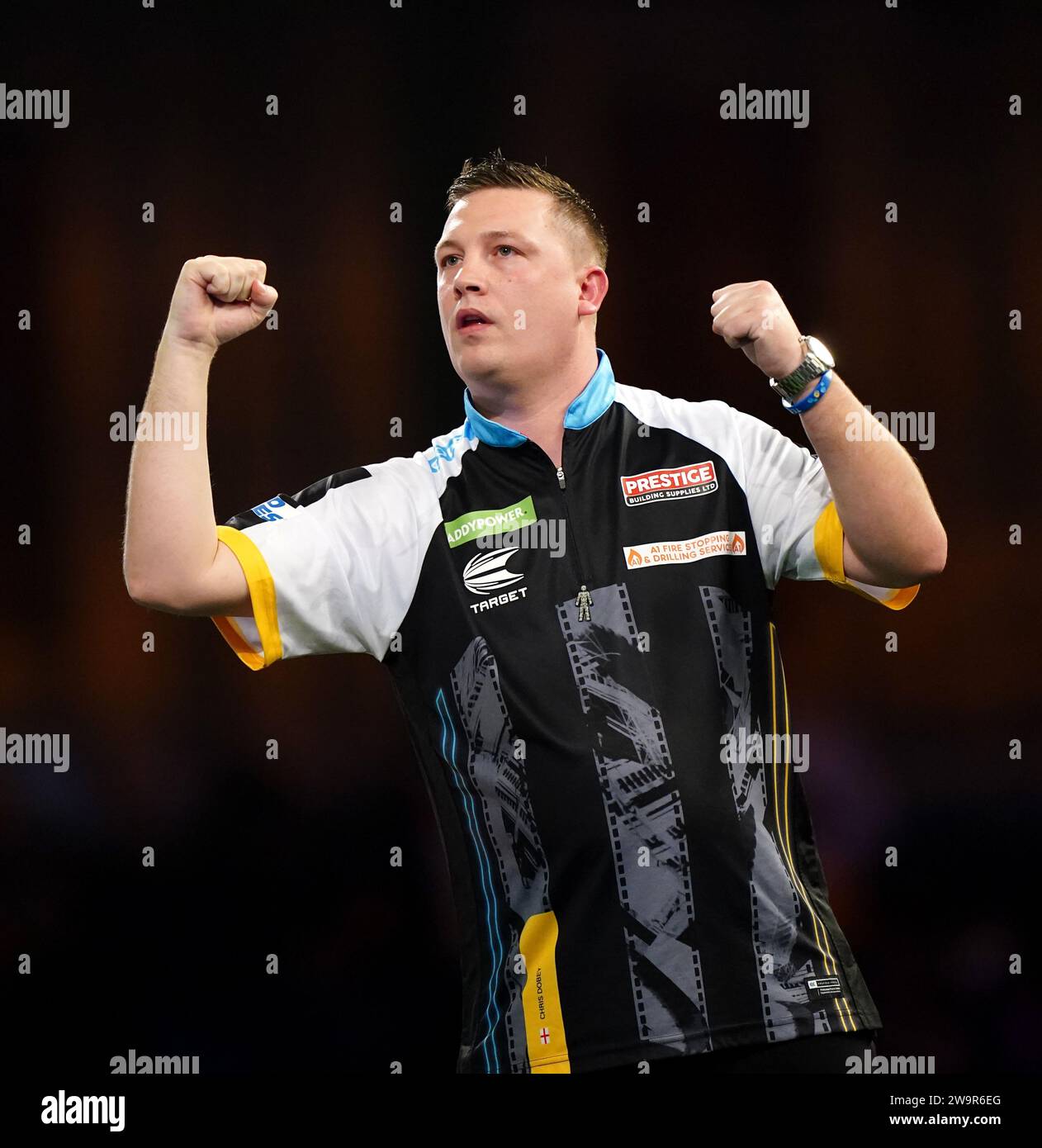 Chris Dobey celebrates after beating Michael Smith (not pictured) on ...