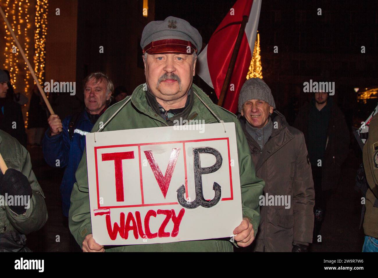 A reader of Gazeta Polska protests in defense of TVP, banner TVP Fights ...