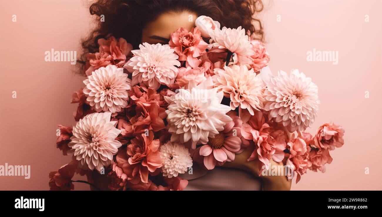 beautiful woman hugging flowers self love Stock Photo - Alamy