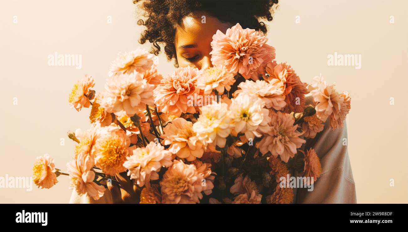 beautiful woman hugging flowers self love Stock Photo - Alamy