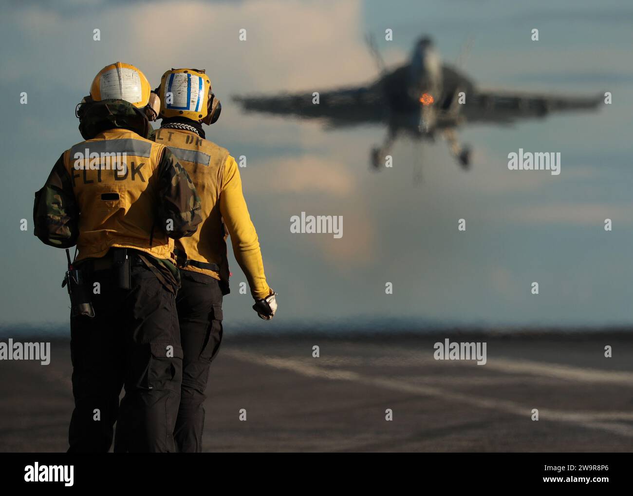 Aviation Boatswain's Mate (Handling) 2nd Class Trevon Smith, left, and ...