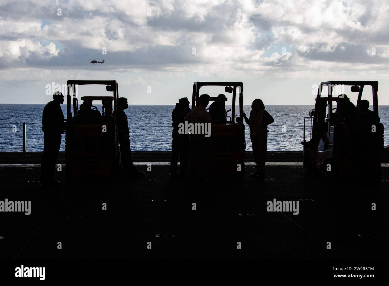 Sailors assigned to the world's largest aircraft carrier USS Gerald R. Ford (CVN 78) stand-by to ...
