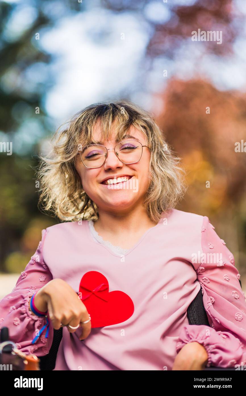 InspireInclusion heart shape, love valentine gesture. Young woman with ...