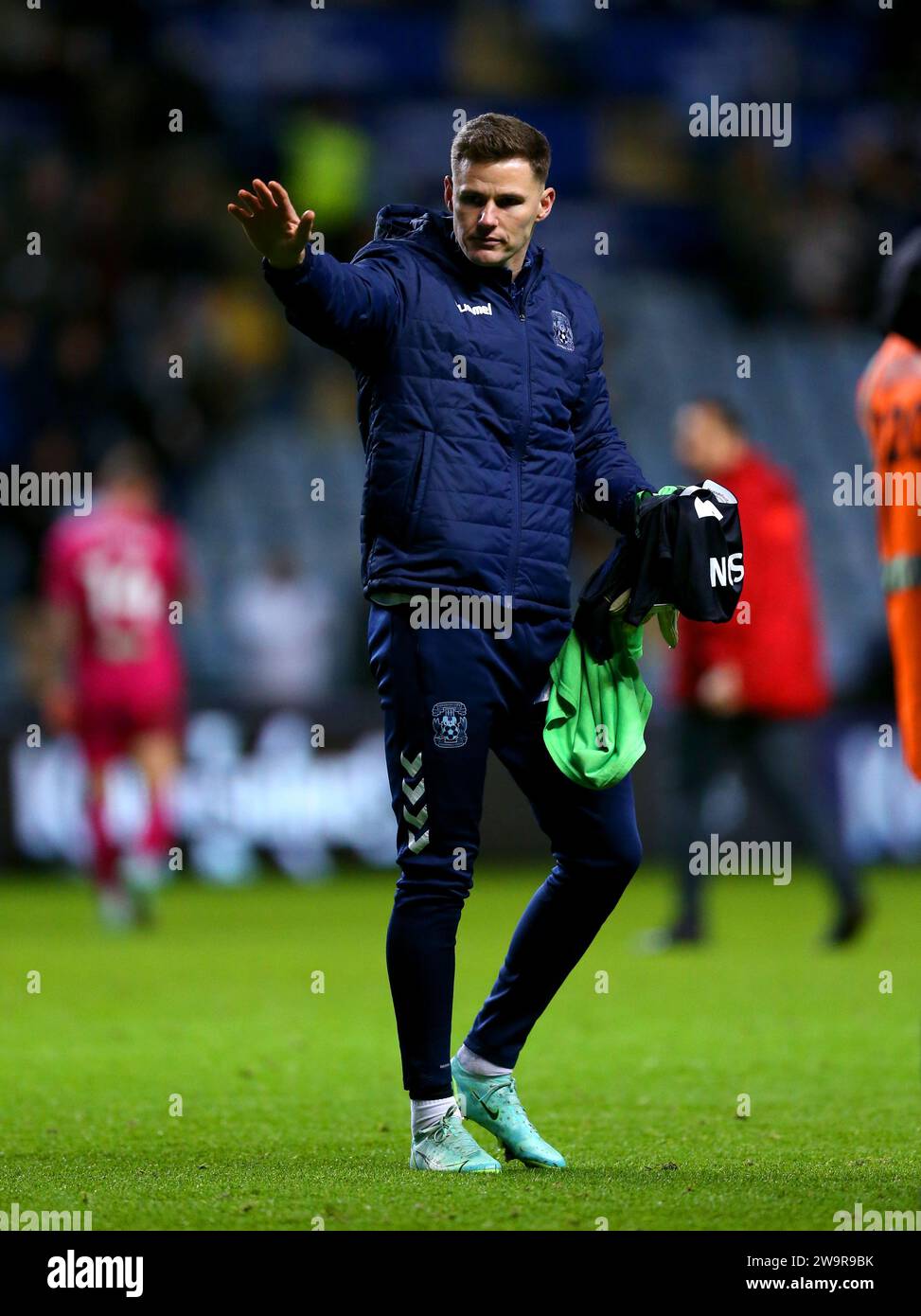 Coventry City goalkeeper Ben Wilson waves to the fans at the end of the ...