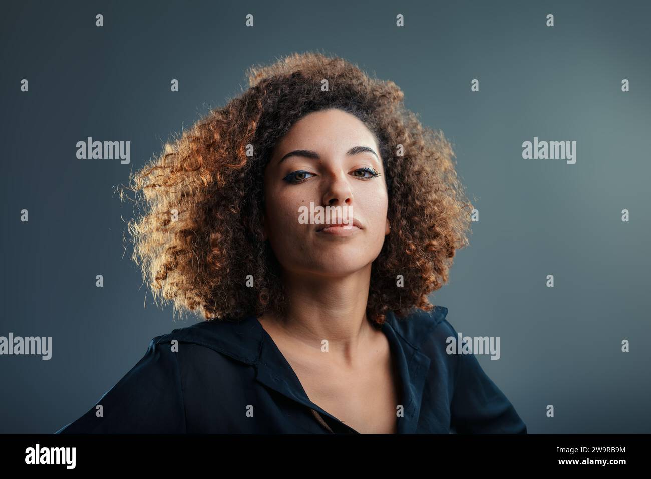 The focused eyes of the woman suggest depth and a thoughtful demeanor ...