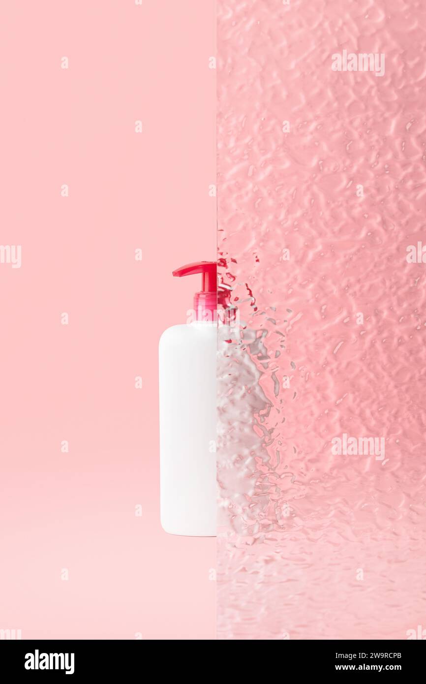 Bottle of intimate hygiene gel on pastel pink background. Beauty ...