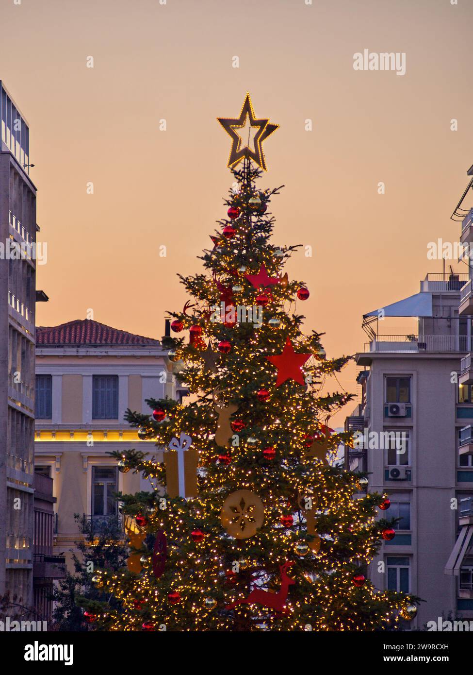 Christmas tree in Syntagma square in sunset colours, Athens, Greece ...