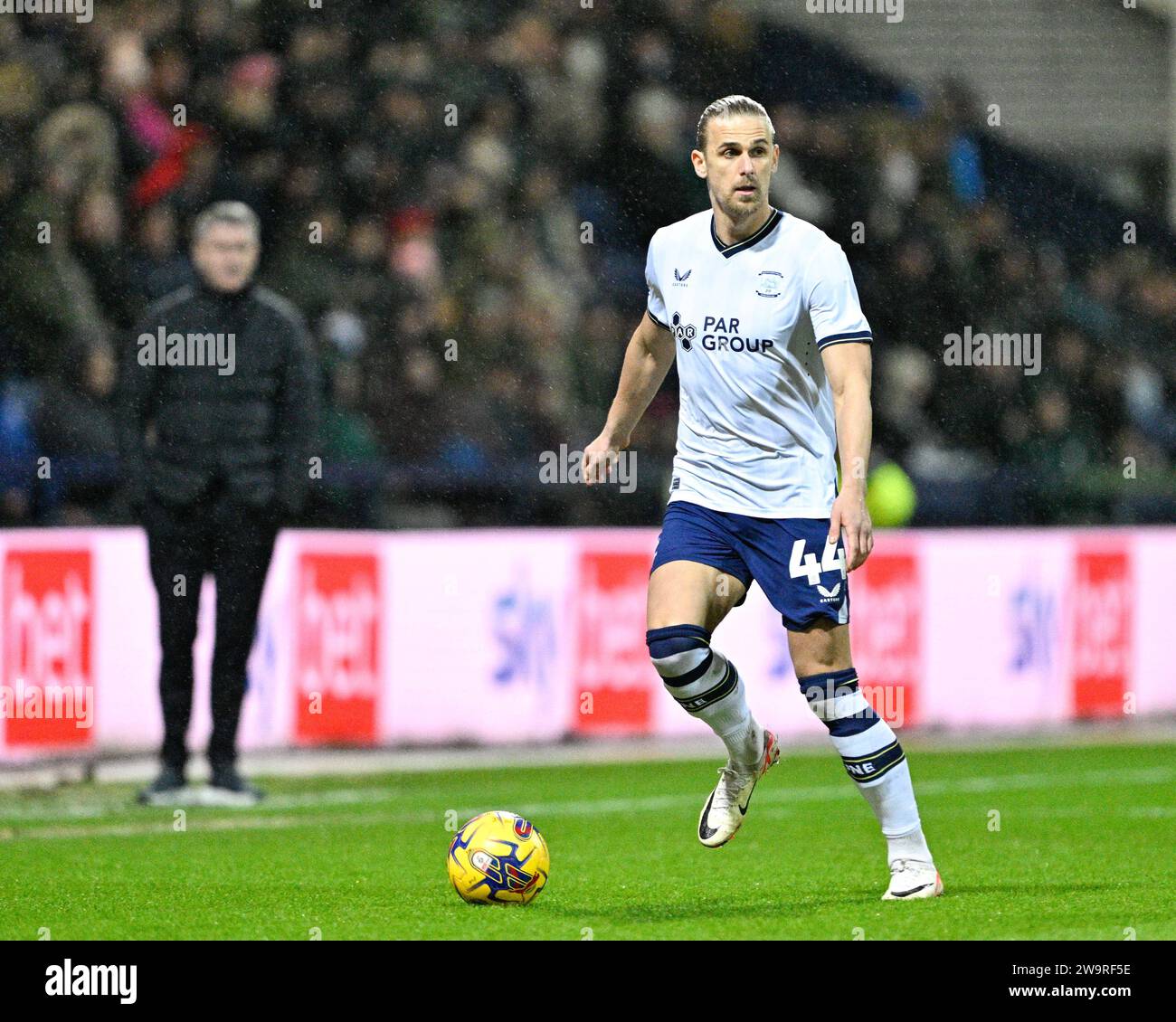 Brad Potts 44# of Preston North End breaks forward with the ball ...