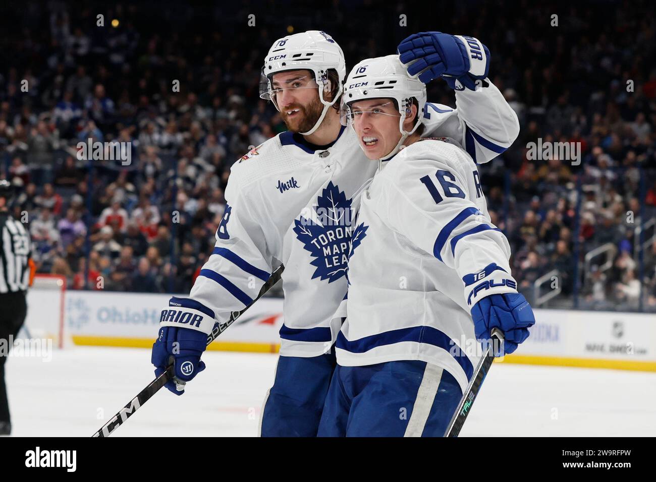 Toronto Maple Leafs' Mitchell Marner, right, celebrates his goal ...